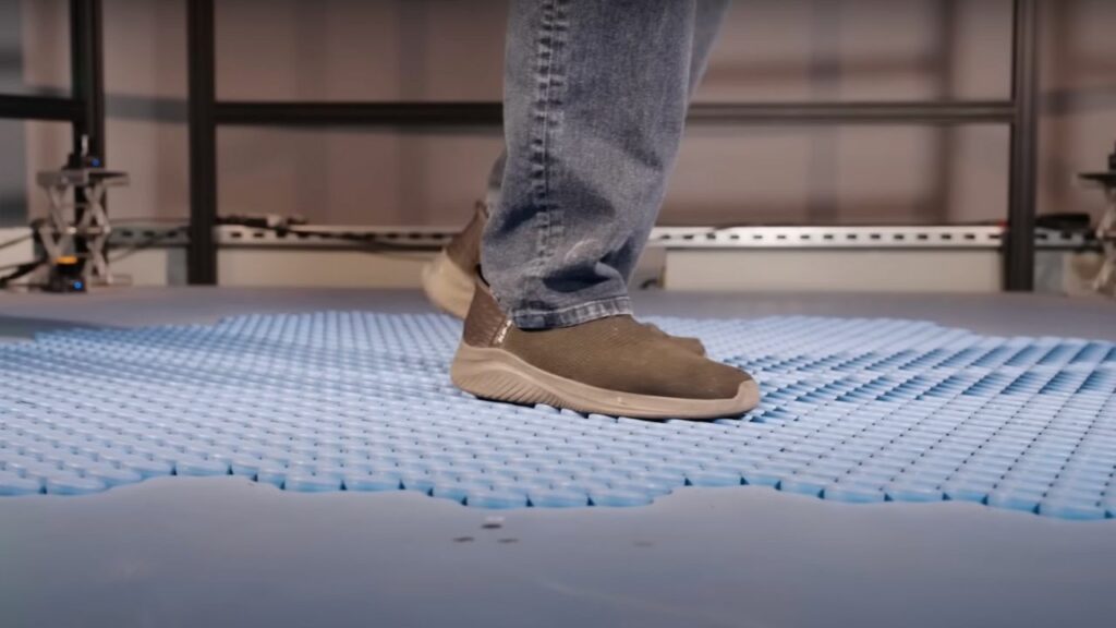 HoloTile: a Disney carpet for moving safely in VR